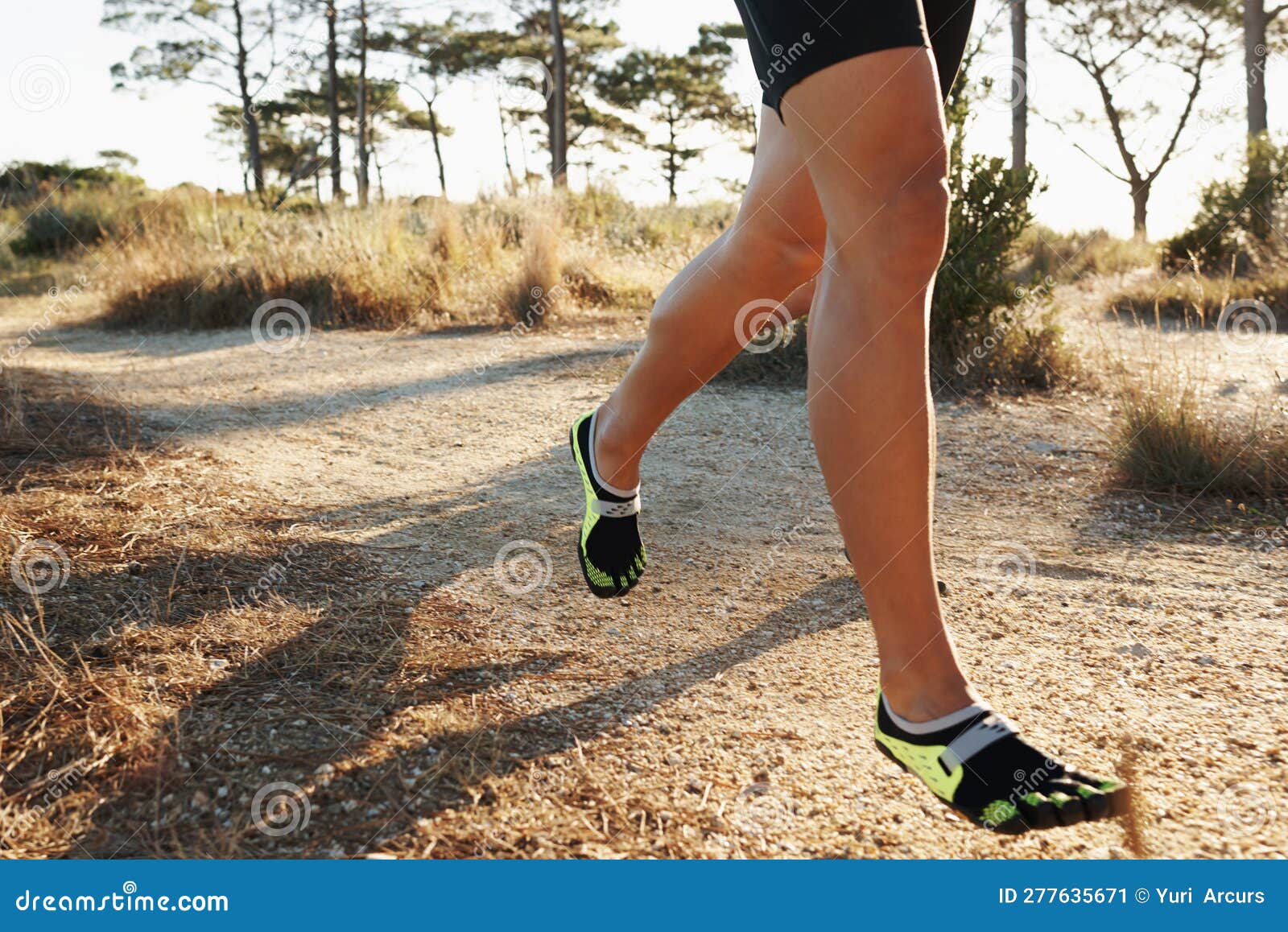 These Legs Were Made for Running. a Young Athlete Running Outdoors ...