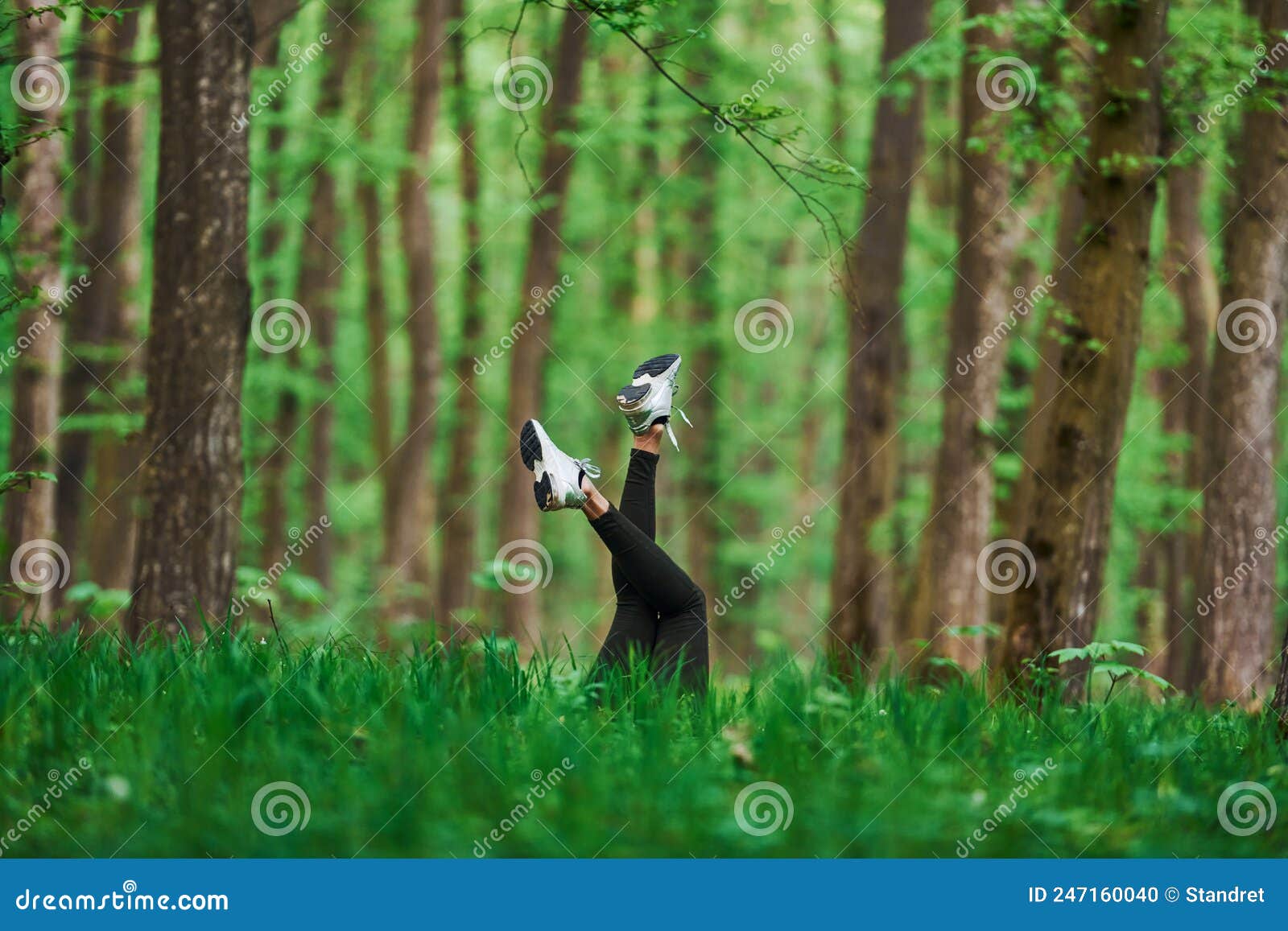 Legs of Woman that Have a Rest and Lying Down on Ground in Forest Stock ...