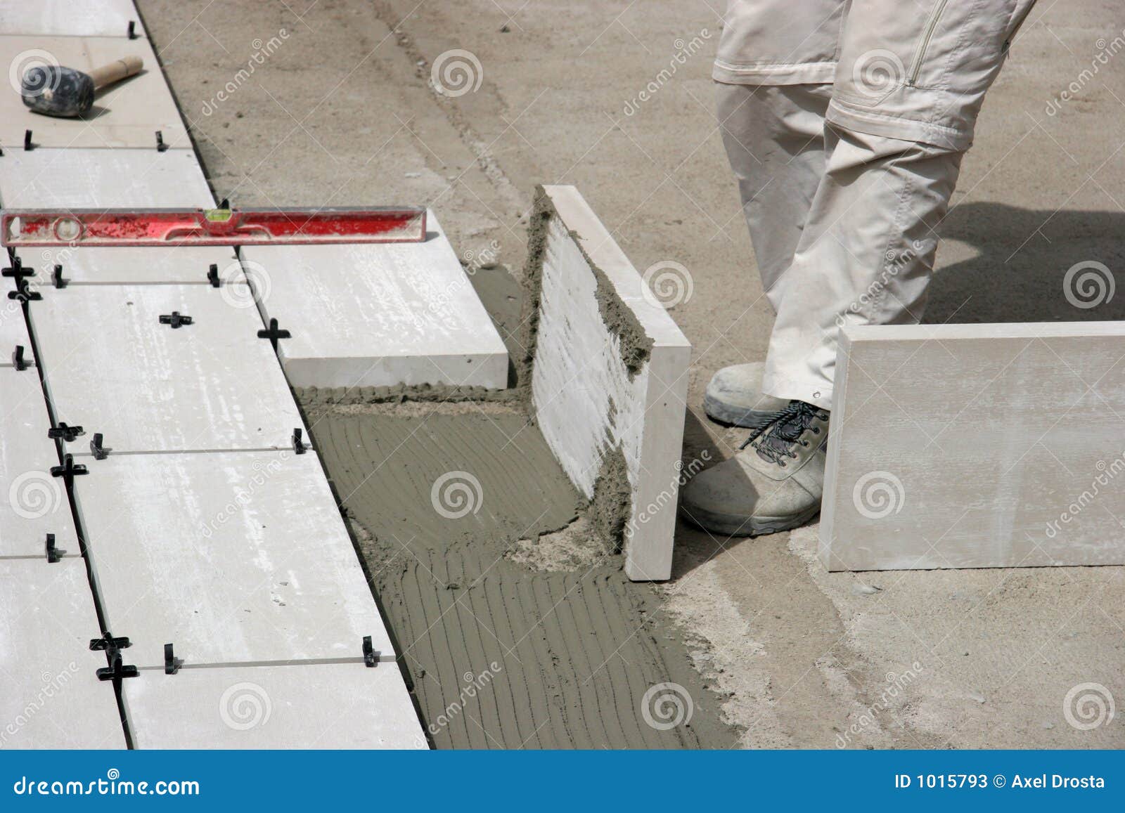 Legs of Worker Laying Tiles Stock Image - Image of pedestrian, outdoor ...