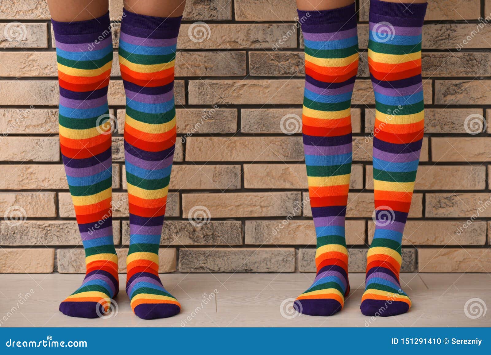 Legs of Young Lesbian Couple in Rainbow Stockings Standing Near Brick ... Legs of Young Lesbian Couple in Rainbow Stockings Standing Near Brick ...