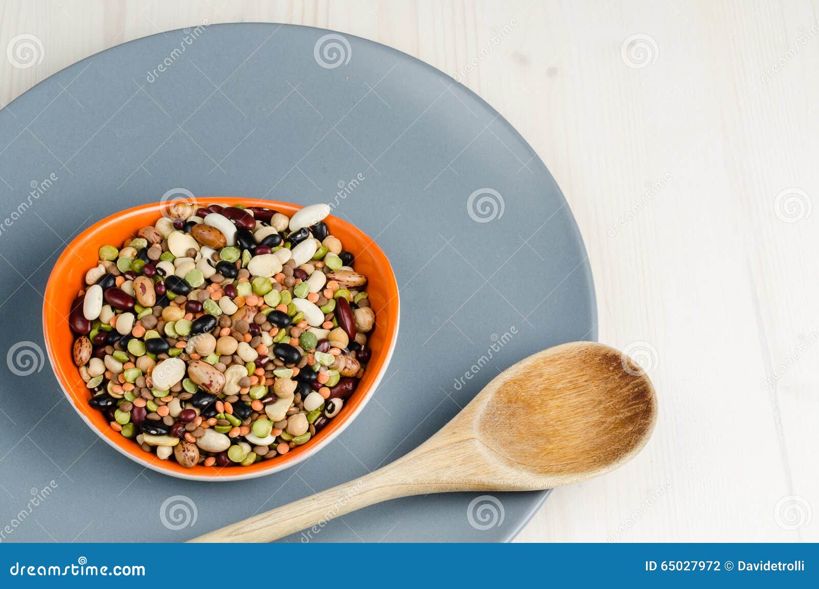 Legumes in a Dish on Wood, with Spoon, Close Up Stock Photo - Image of ...