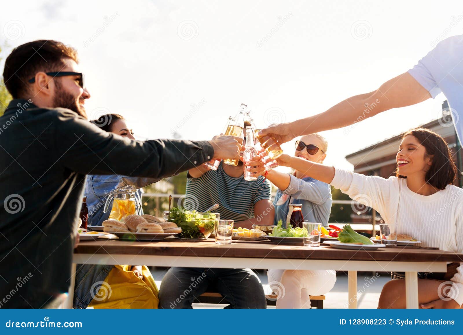 Happy Friends Toasting Drinks At Rooftop Party Stock Image Image Of