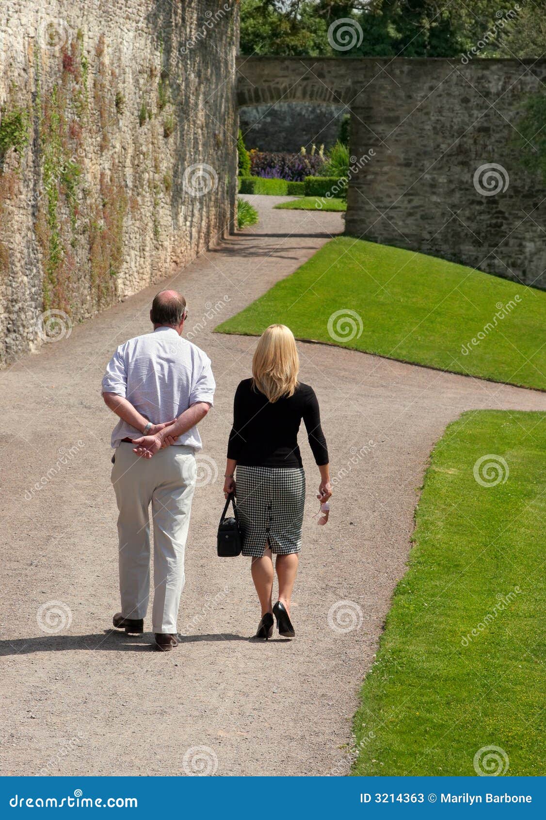 Leisurely Stroll stock image. Image of lawns, summer, humans - 3214363