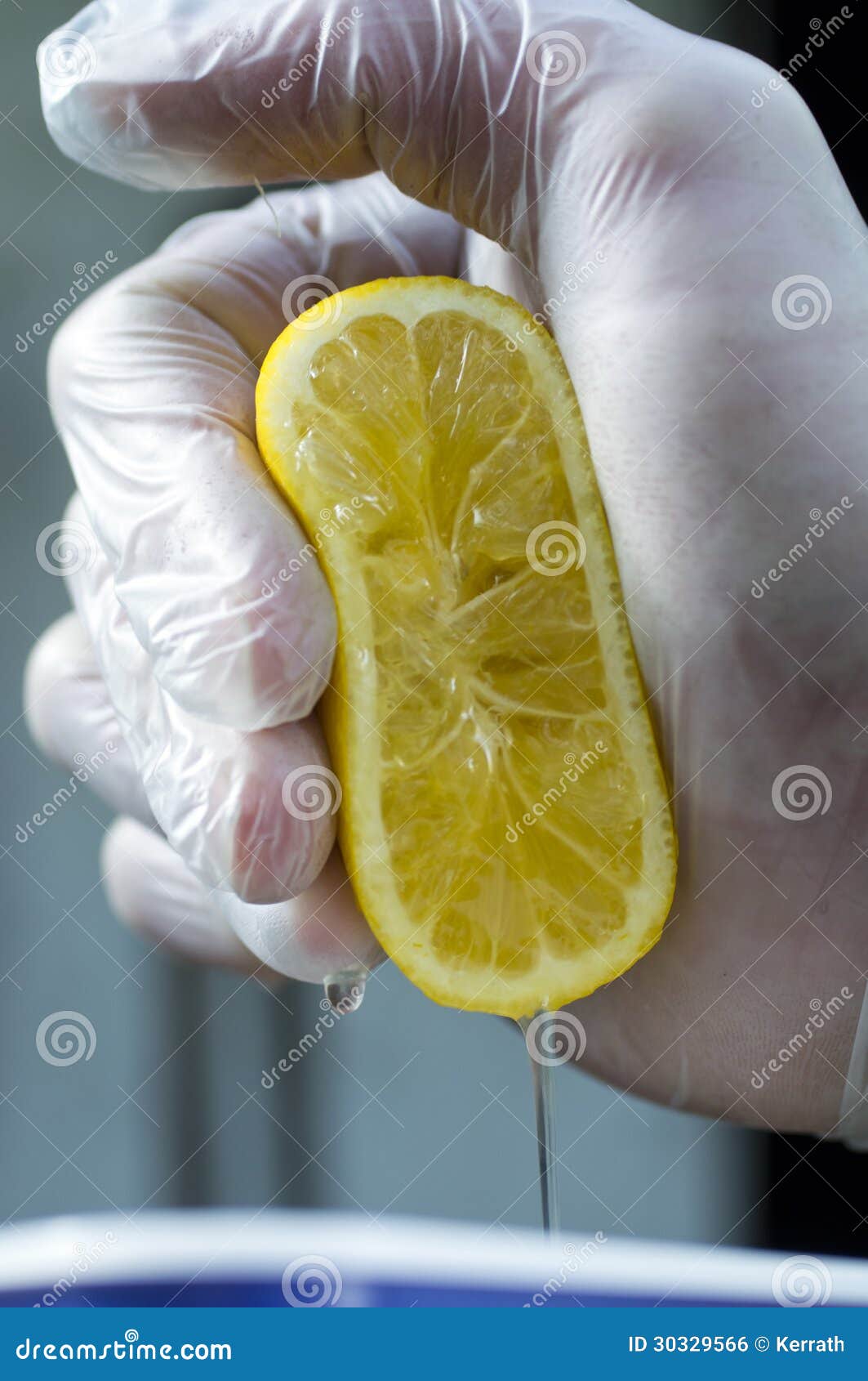 Lemon Being Squeezed stock photo. Image of hand, citrus - 30329566