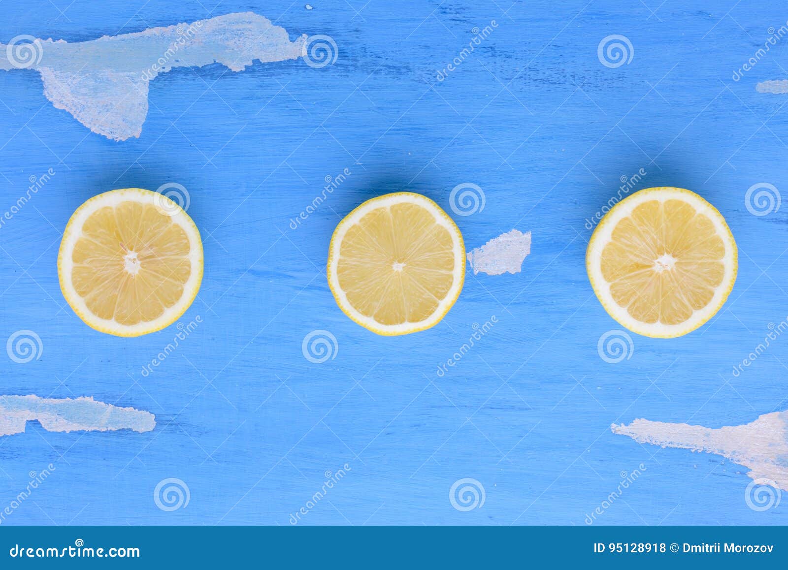 Lemon on a blue background stock photo. Image of blue - 95128918