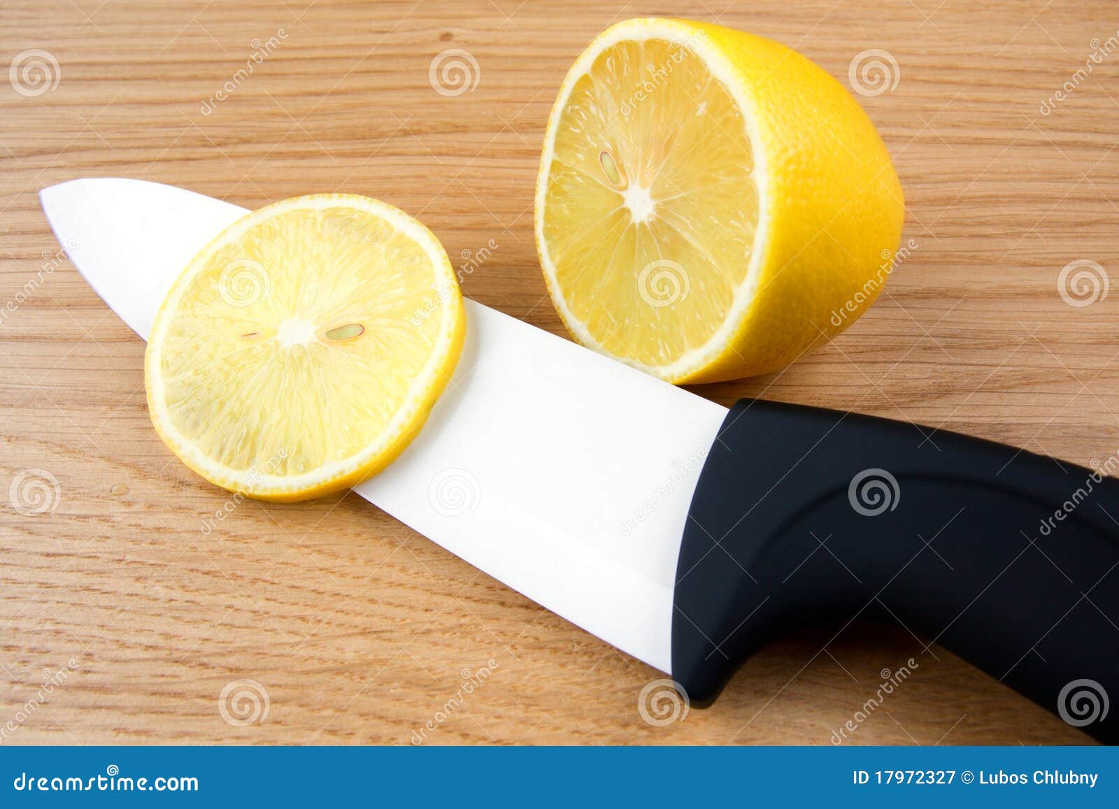 Lemon and ceramic knife stock image. Image of health - 17972327