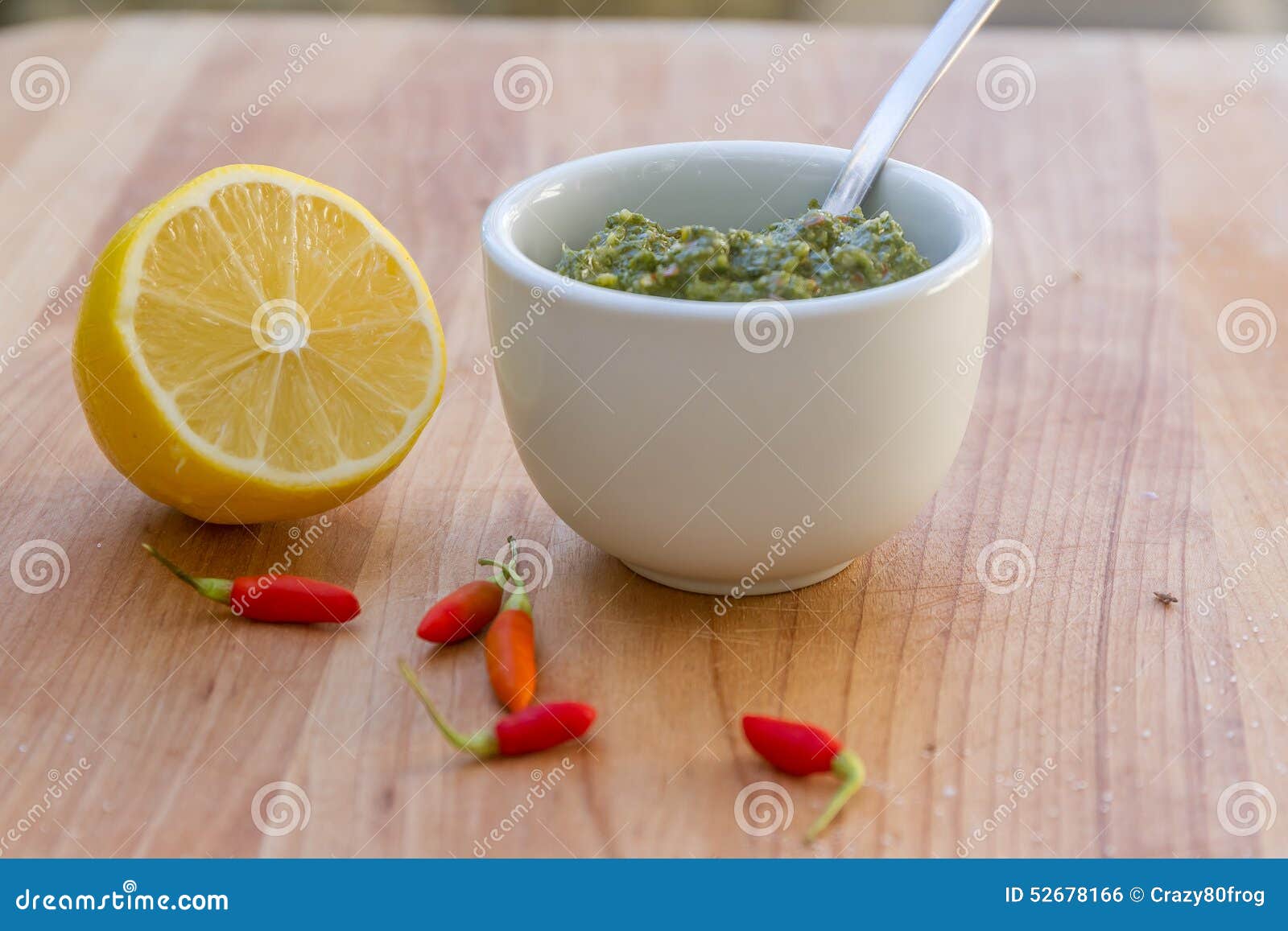 Lemon, Chilli Pepper and Source on Wooden Cutting Board, Cooking Stock ...