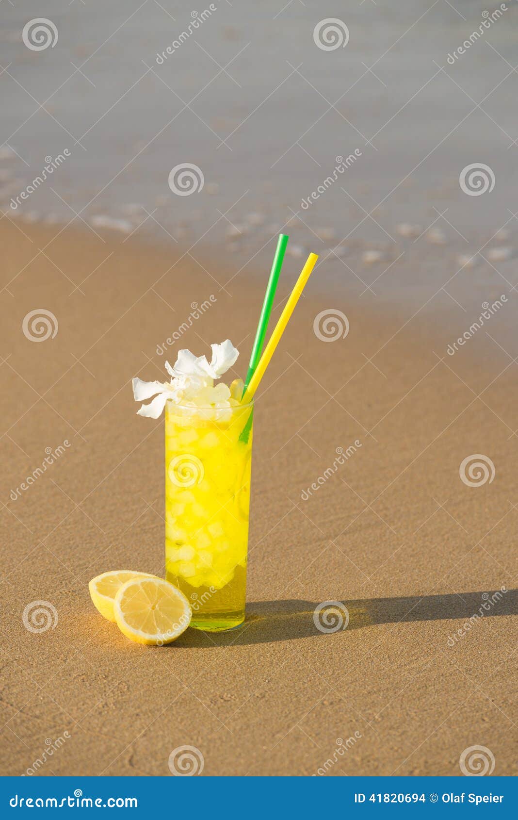 Lemon cocktail on the sand stock photo. Image of cocktail - 41820694