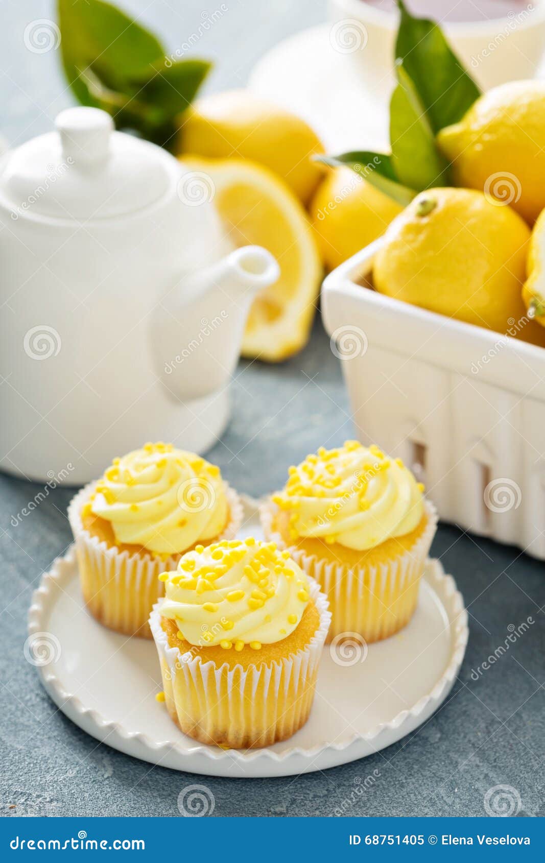 Lemon Cupcakes with Bright Yellow Frosting Stock Image - Image of mini ...