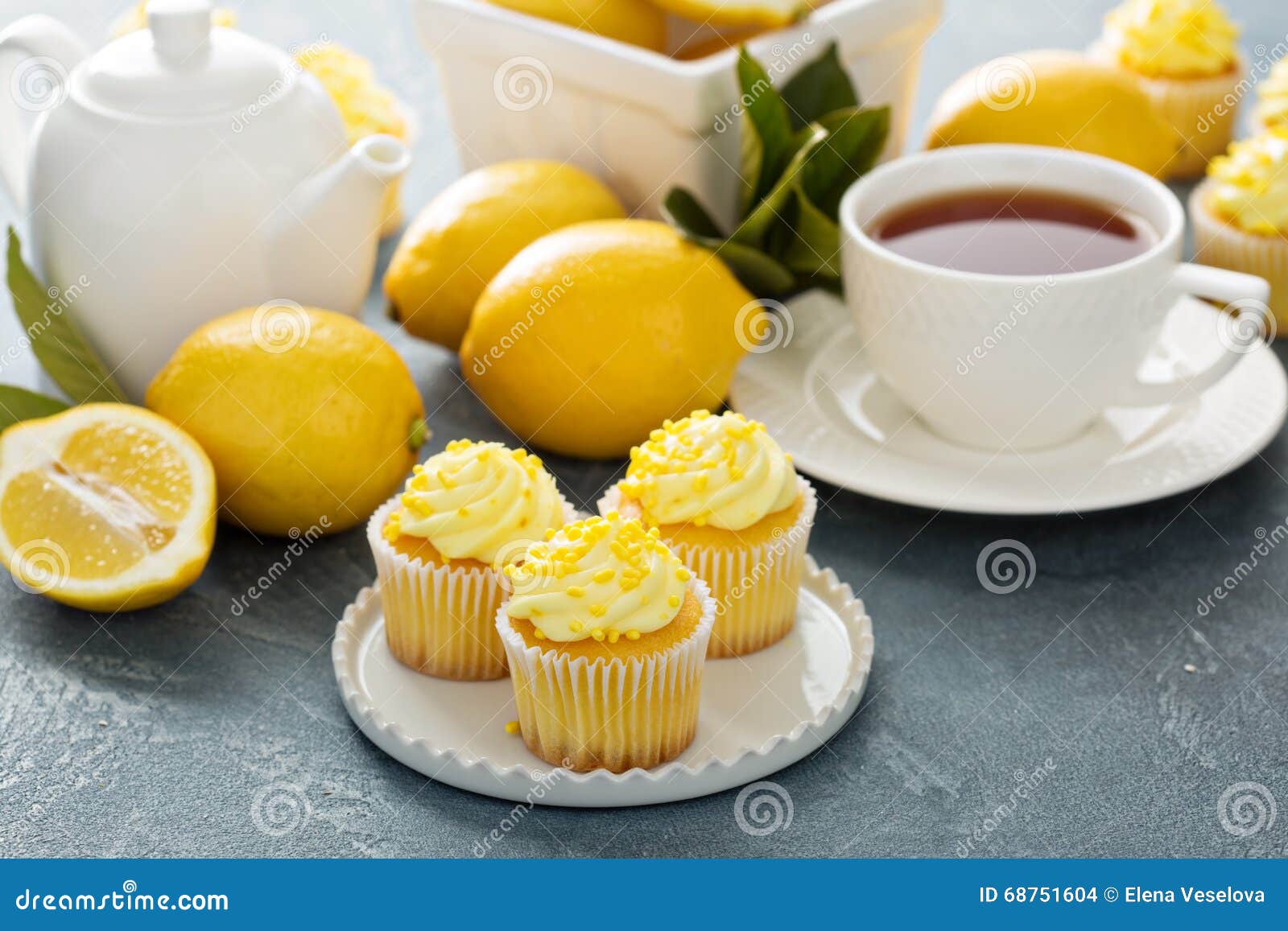Lemon Cupcakes with Bright Yellow Frosting Stock Photo - Image of fairy ...