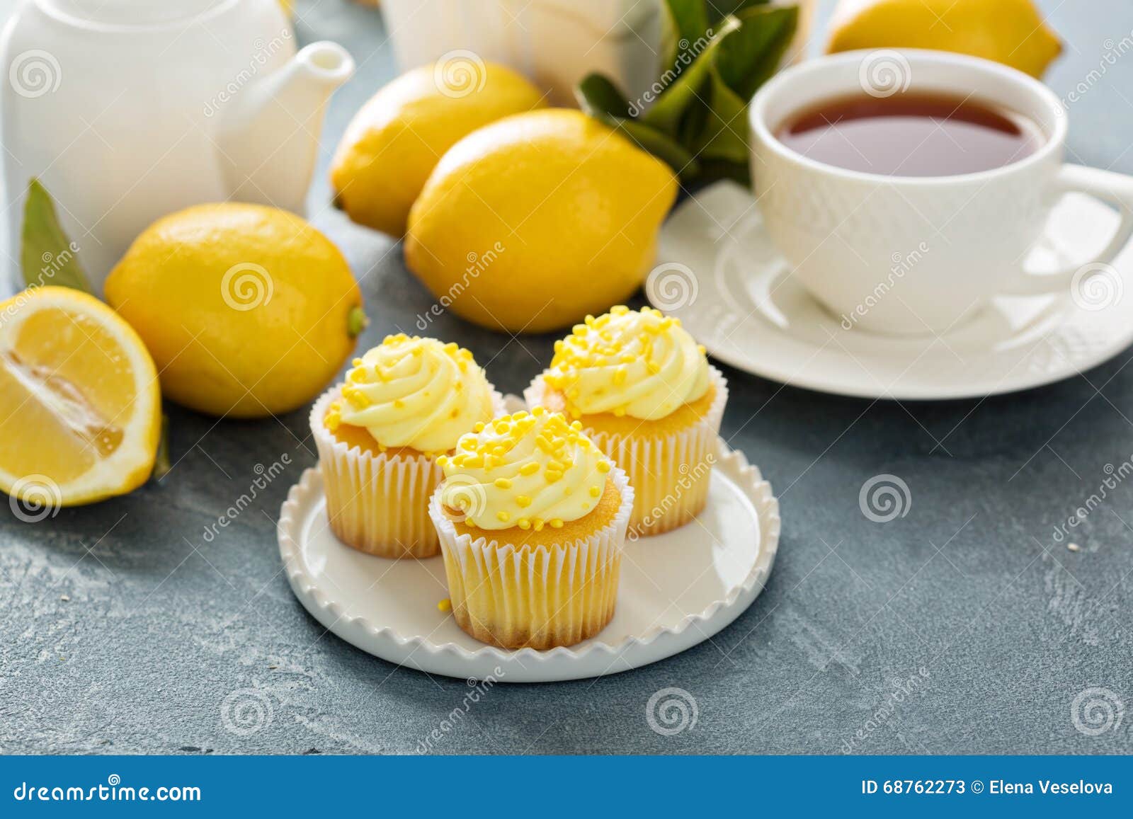 Lemon Cupcakes with Bright Yellow Frosting Stock Image - Image of brown ...