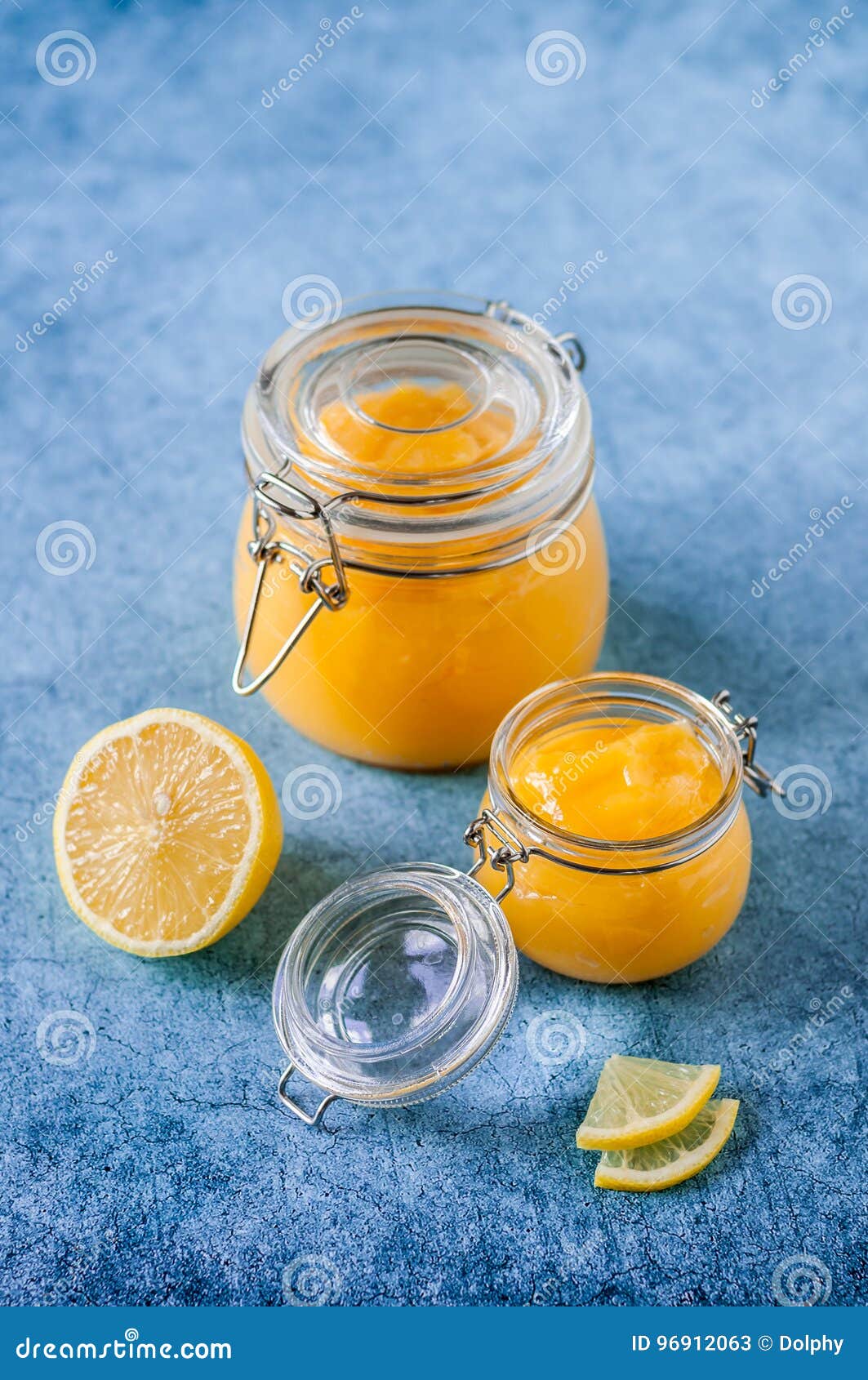 Lemon Curd in Jars Over Blue Background Stock Image - Image of glass ...
