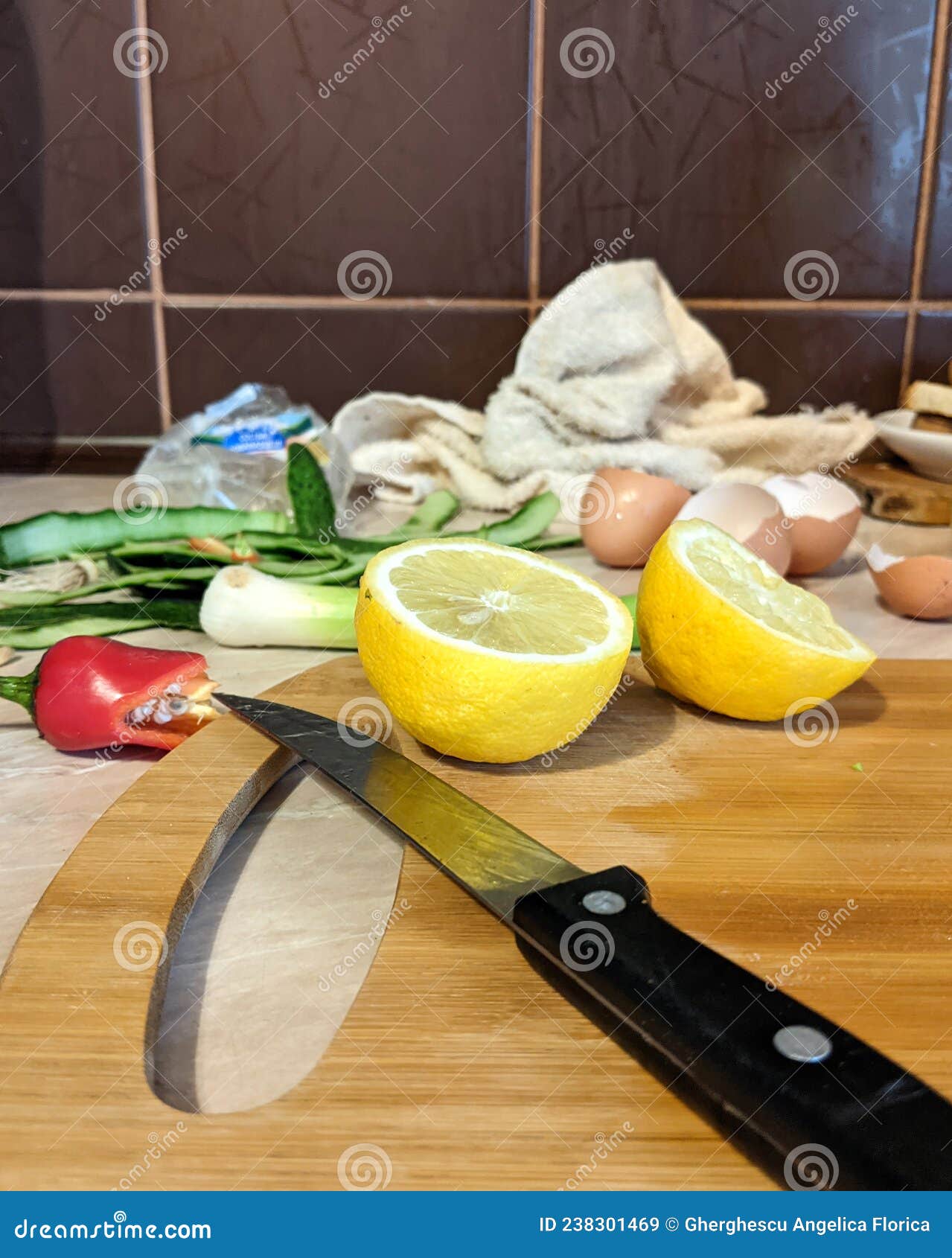 Lemon Cut in Half, Broken Red Pepper, Eggshells and Kitchen Utensils ...