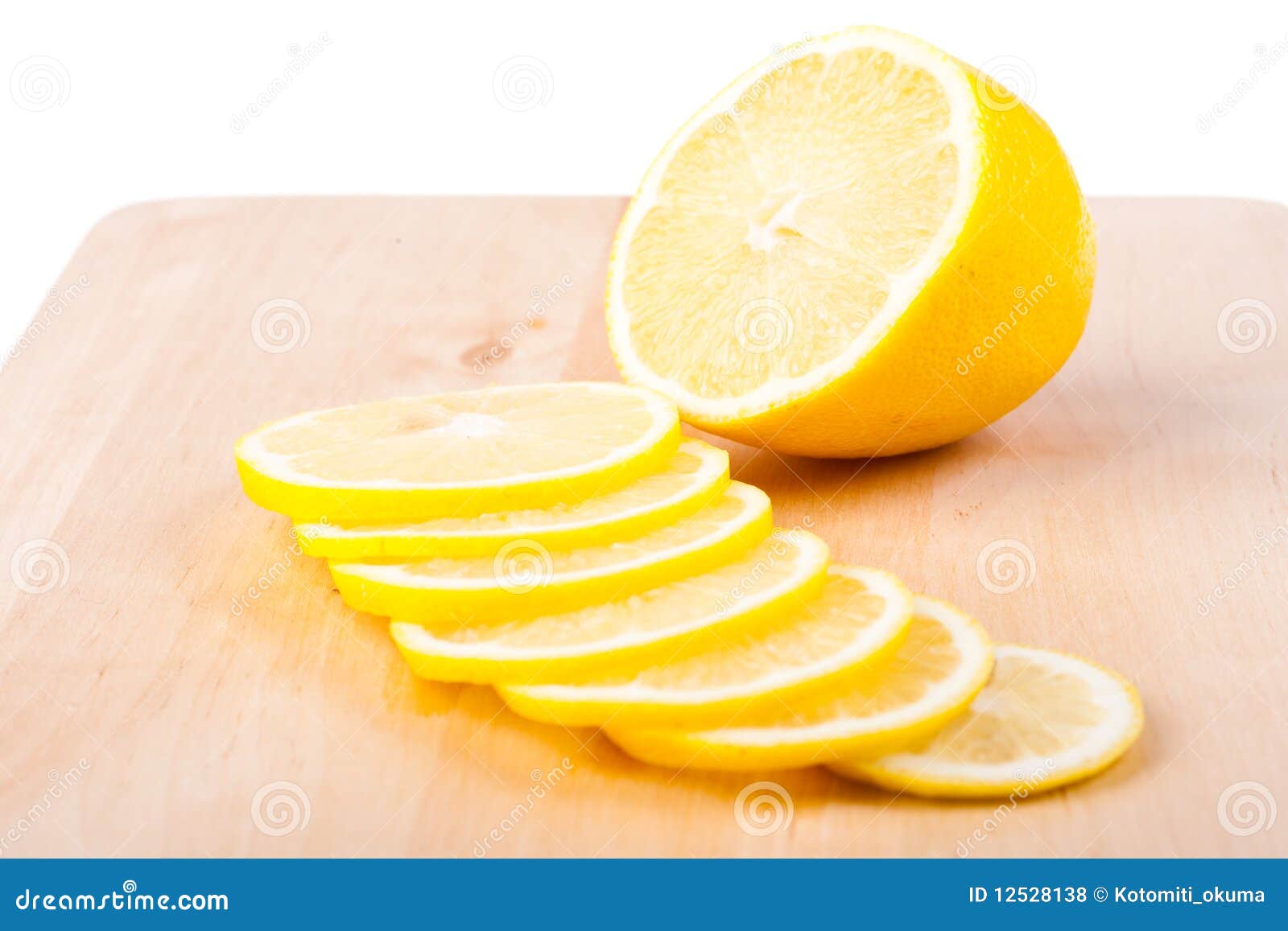 The Lemon Cut by Segments Lies on Chopping Board. Stock Photo - Image ...