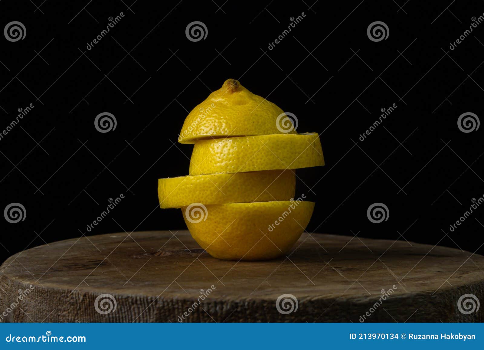 Lemon on a Dark Background. Sliced Lemon on a Black Background Stock ...