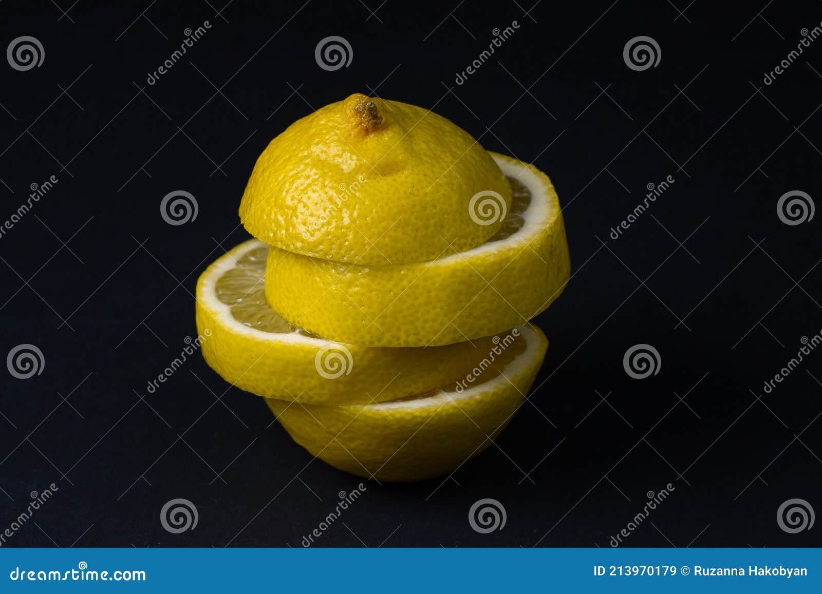 Lemon on a Dark Background. Sliced Lemon on a Black Background Stock ...