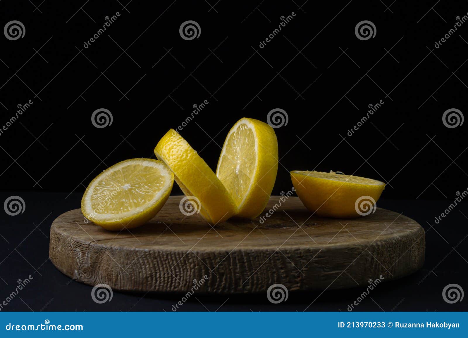 Lemon on a Dark Background. Sliced Lemon on a Black Background Stock ...