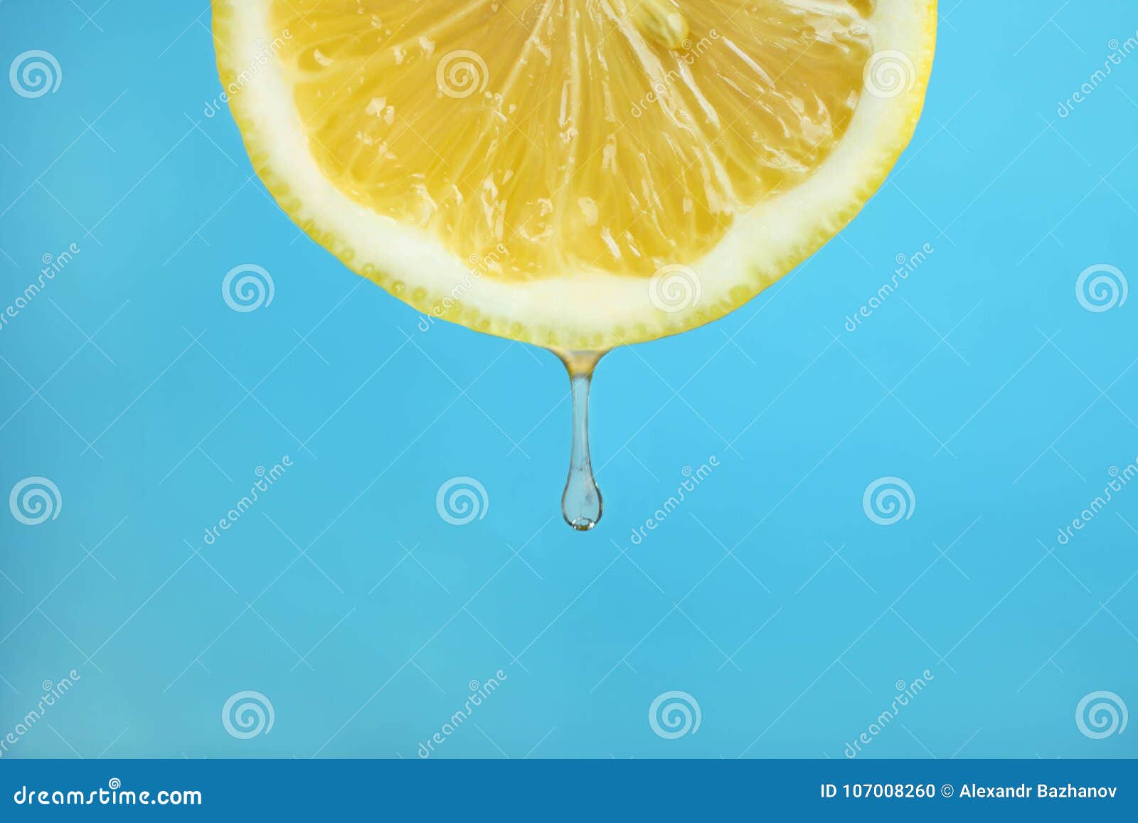 Lemon with a drop stock photo. Image of tropical, background - 107008260