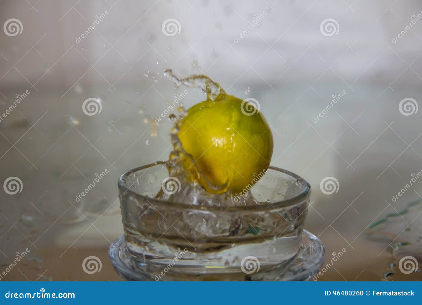 Lemon drop in water. stock photo. Image of dropped, summer - 96480260