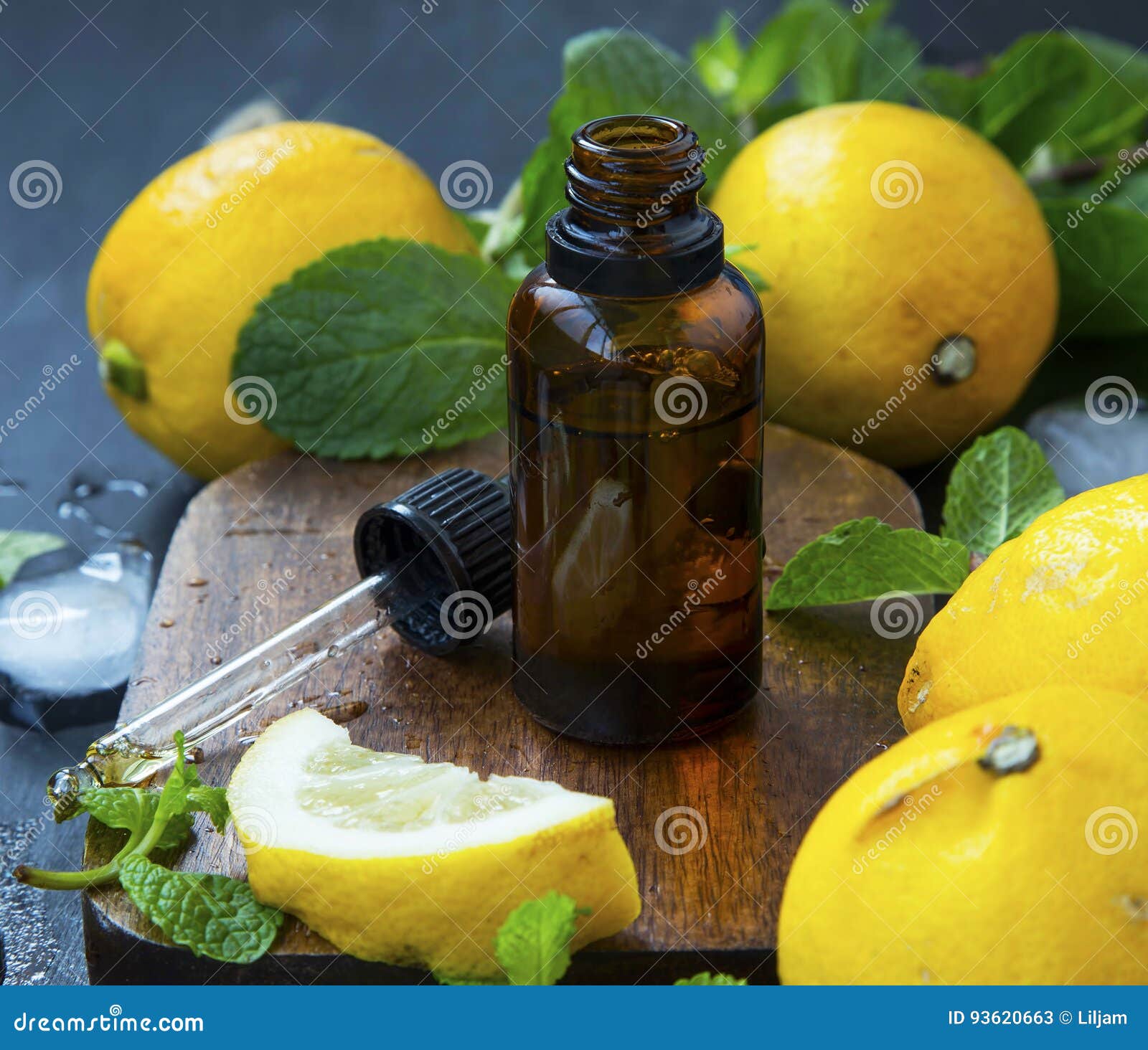 Lemon essential oil bottle stock image. Image of citrus - 93620663