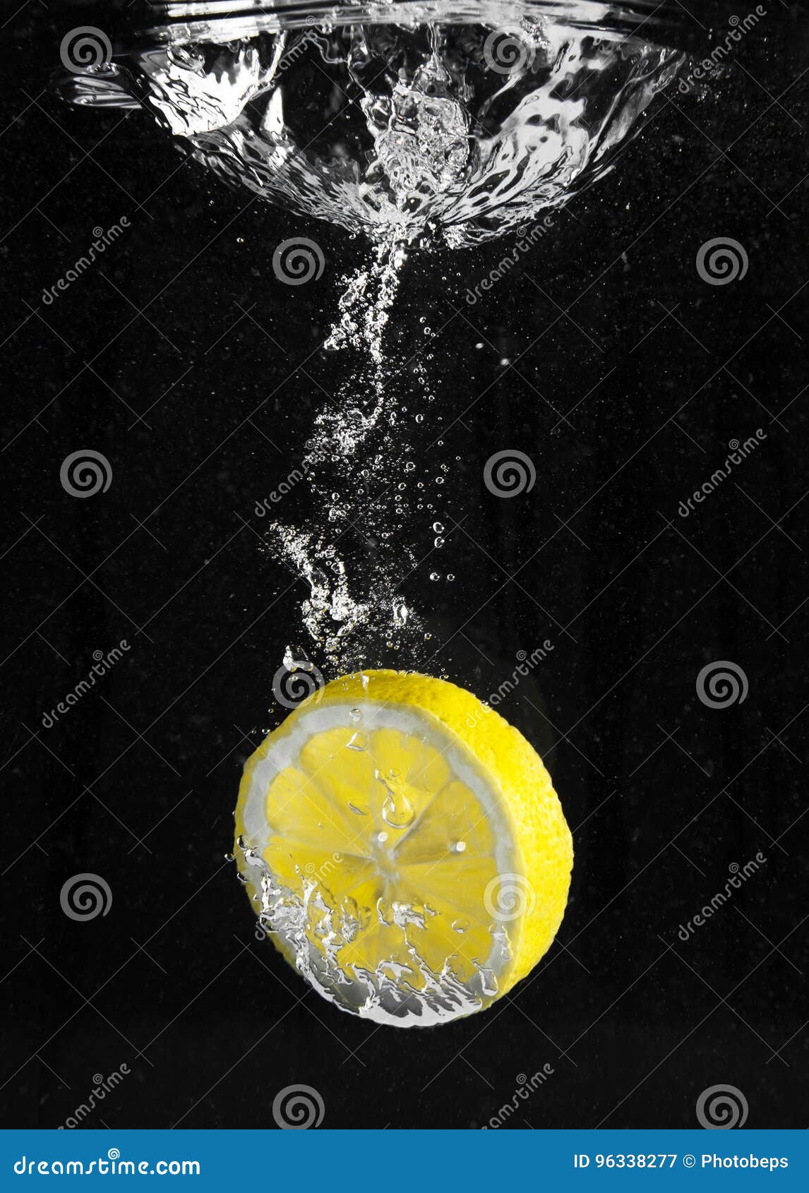 Lemon falling in water stock image. Image of lemon, natural - 96338277