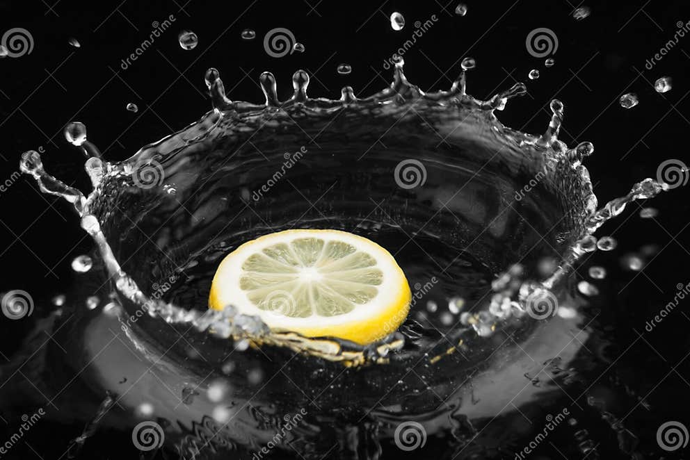 Lemon falls into water stock photo. Image of healthy - 31316052