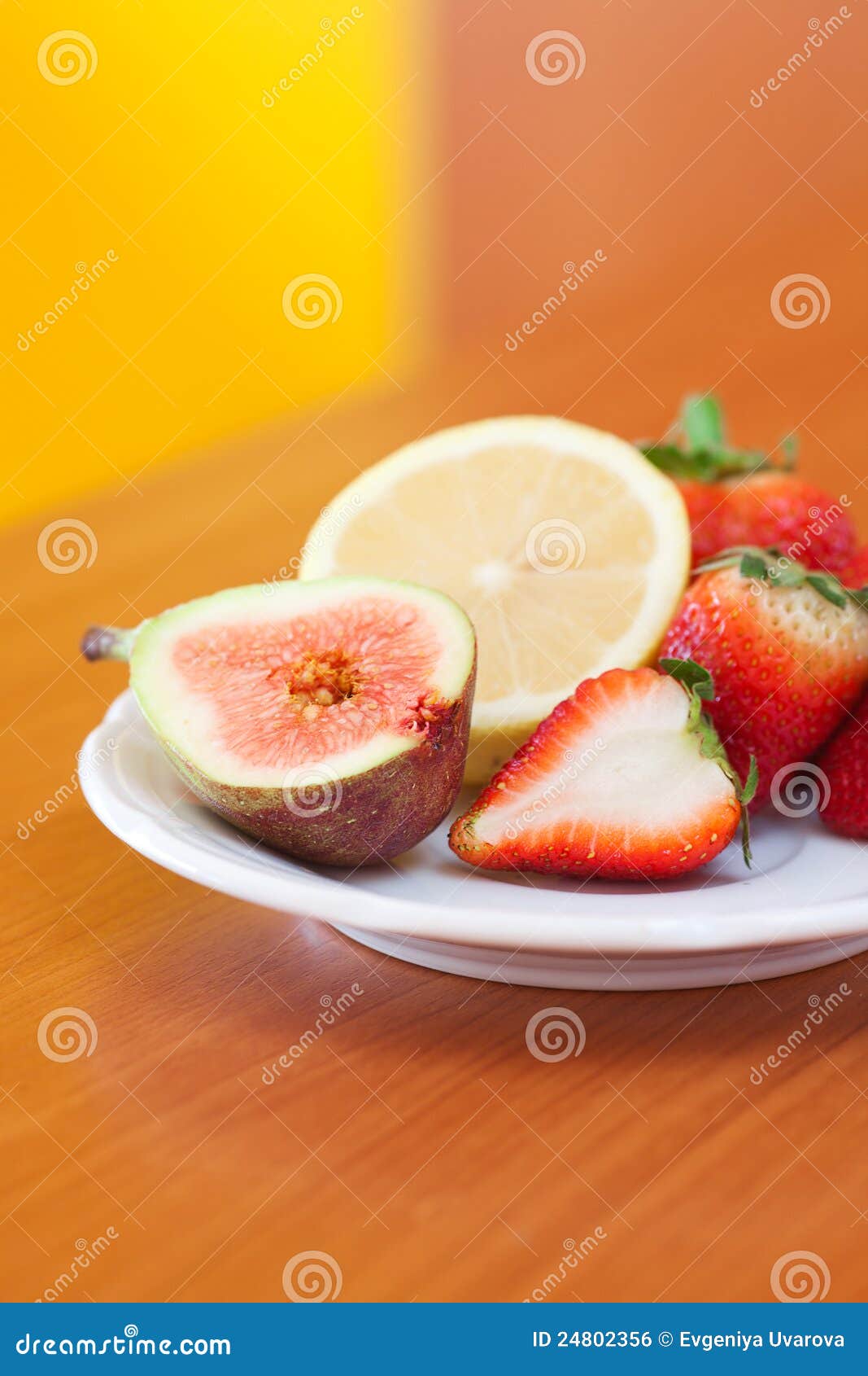 Lemon, Fig and Strawberries Stock Photo - Image of plaid, food: 24802356