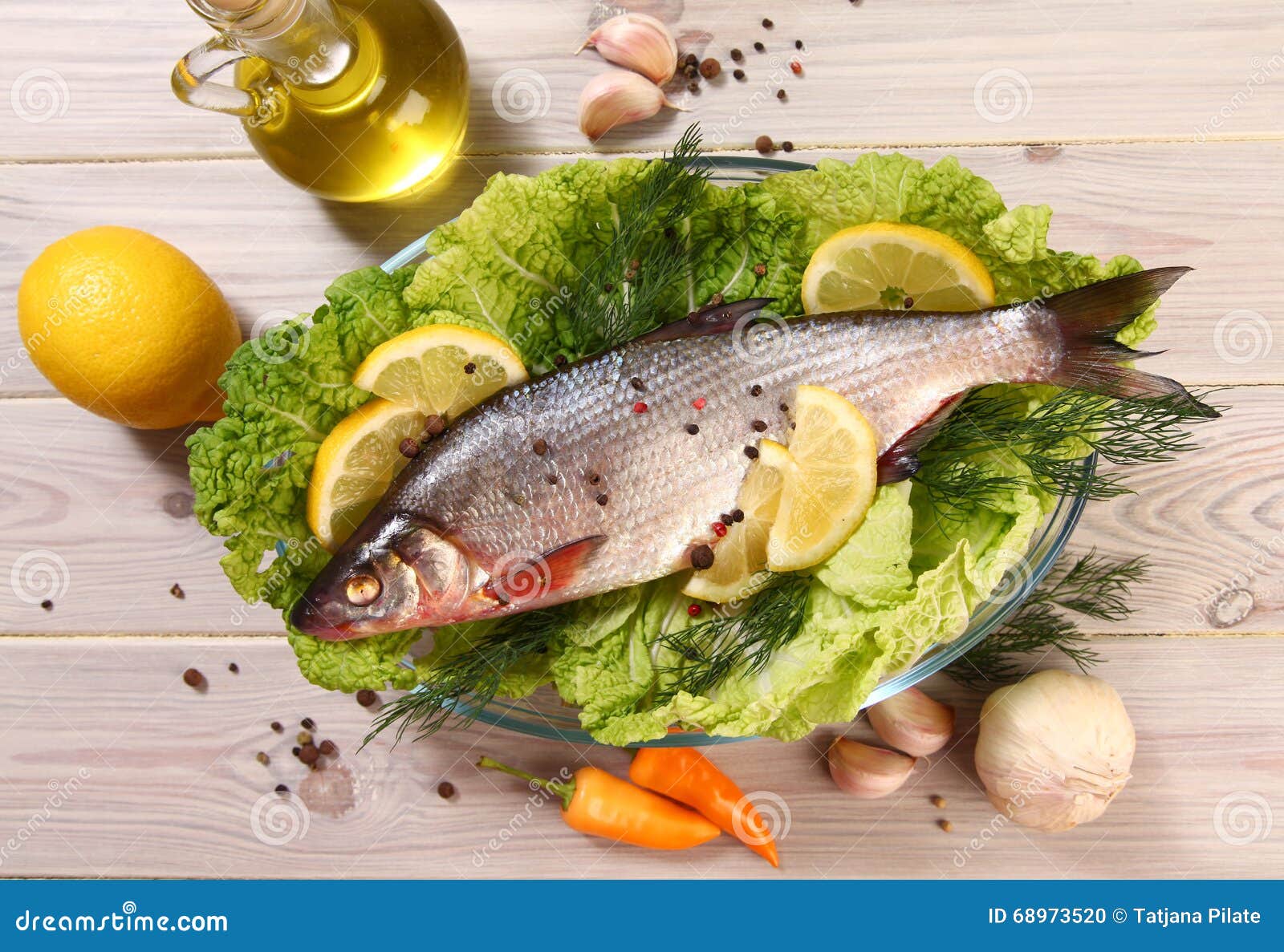 Lemon and fish stock photo. Image of ingredient, garlic - 68973520