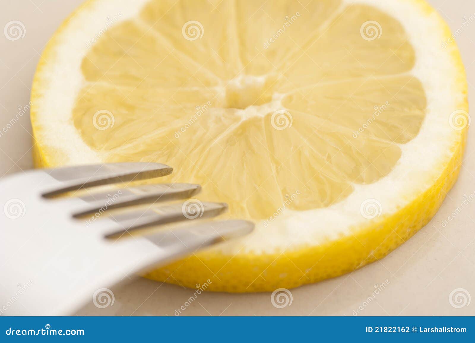 Lemon And Fork Stock Photo | CartoonDealer.com #21822162