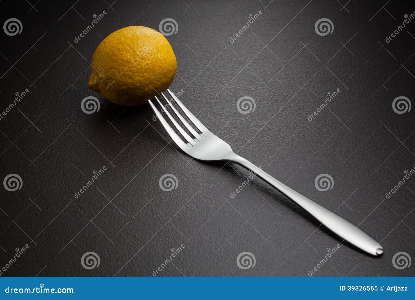 Lemon and fork on black stock image. Image of closeup - 39326565