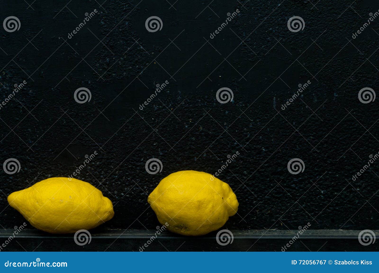 Lemon in Front of Rough Textured Black Background Stock Image - Image ...