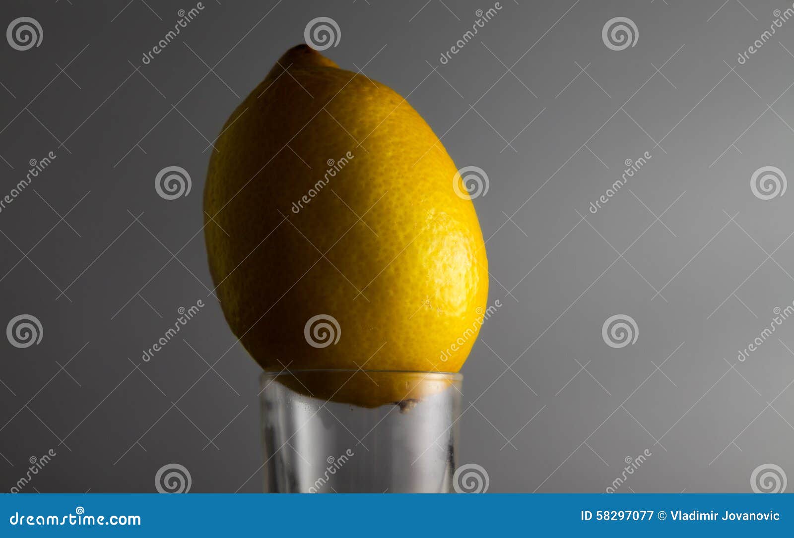 Lemon in glass stock image. Image of yellow, light, fruit - 58297077