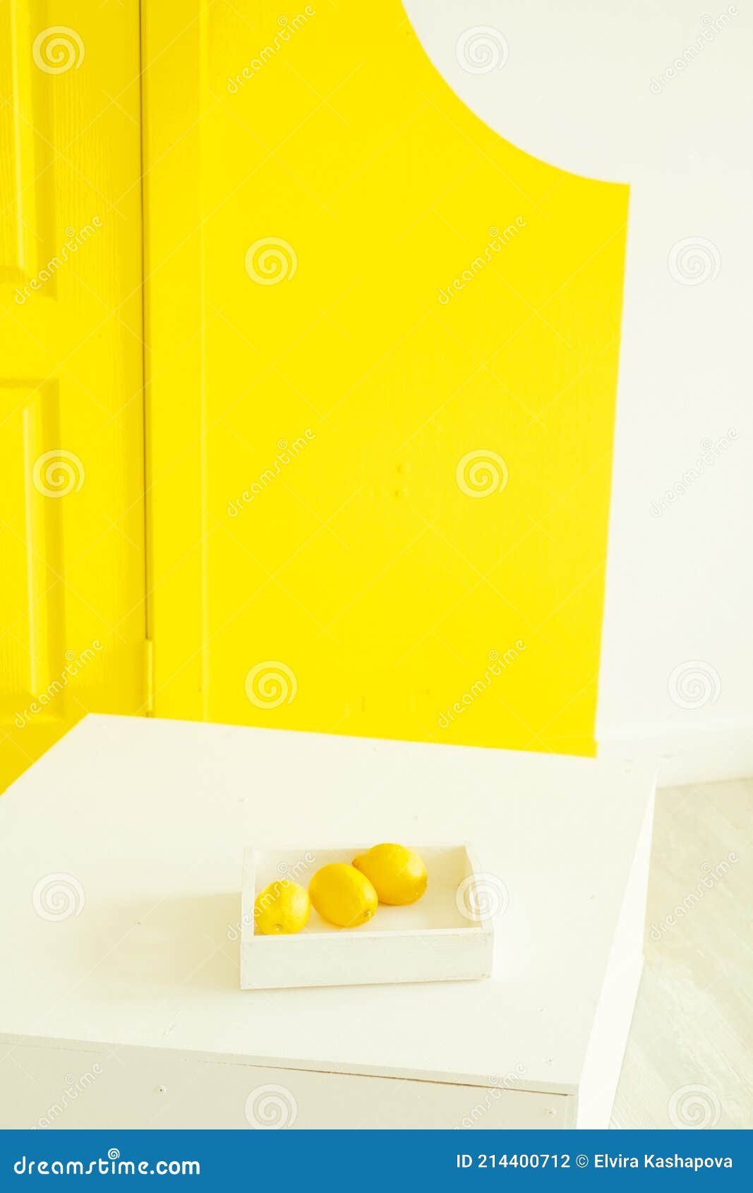 Bright Yellow Lemons on a Yellow Background. Lemons on a White Tray ...