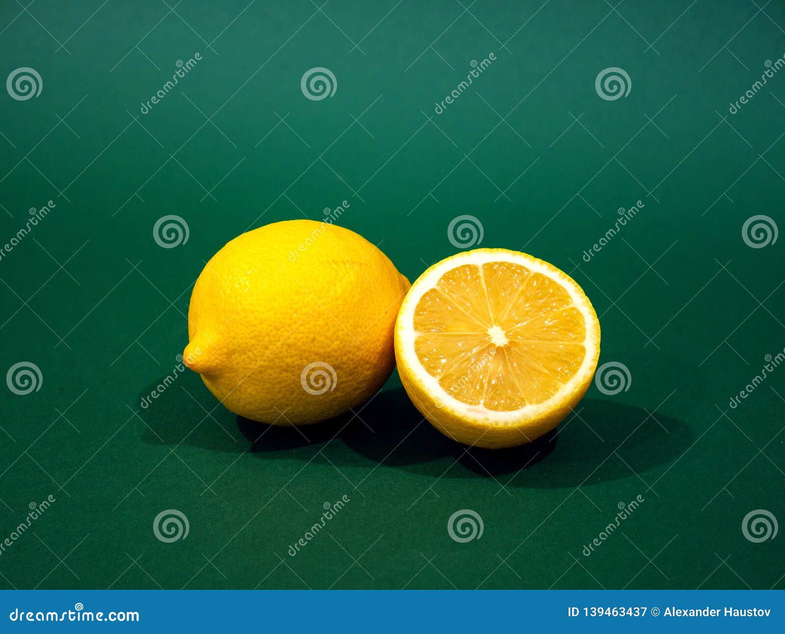 Lemon and Half of Lemon on Green Background Isolation Stock Image ...