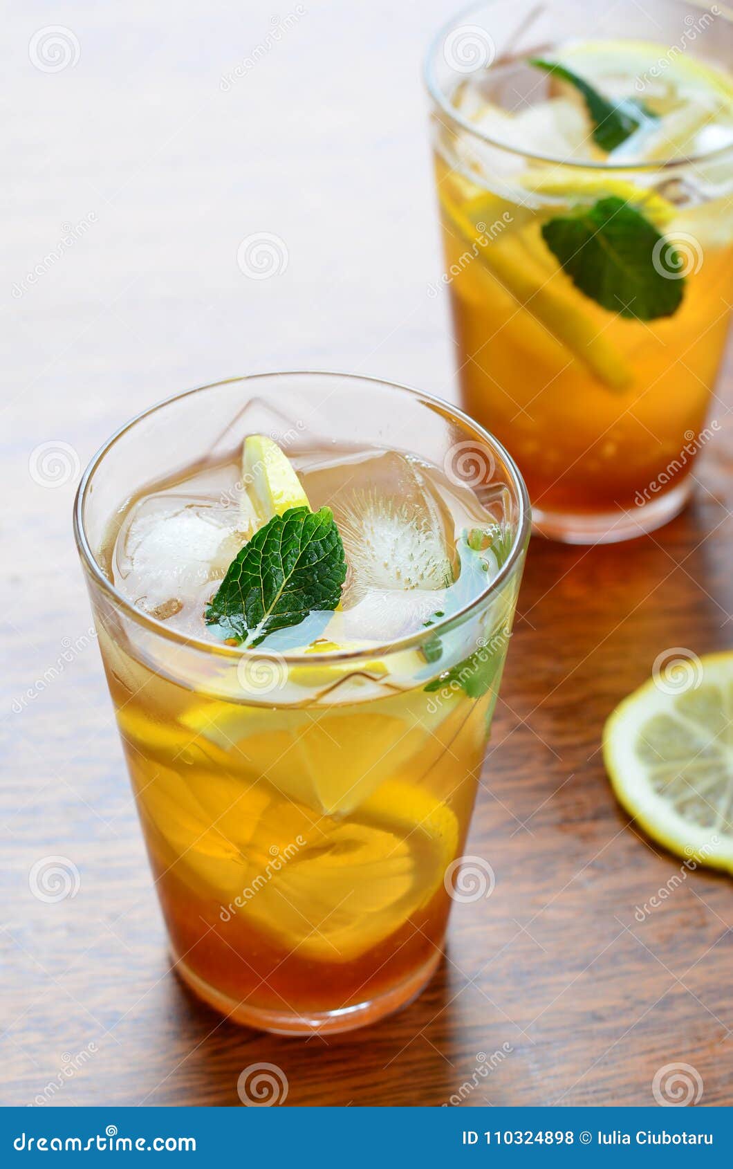 Lemon iced tea with mint stock photo. Image of rustic - 110324898