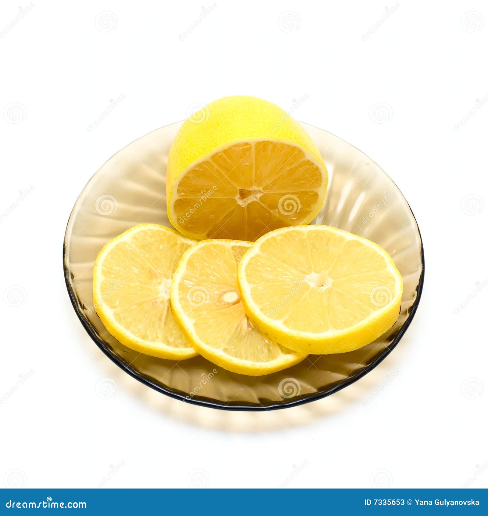 Lemon and Lemon Slices on Plate Stock Image - Image of plate, organic ...