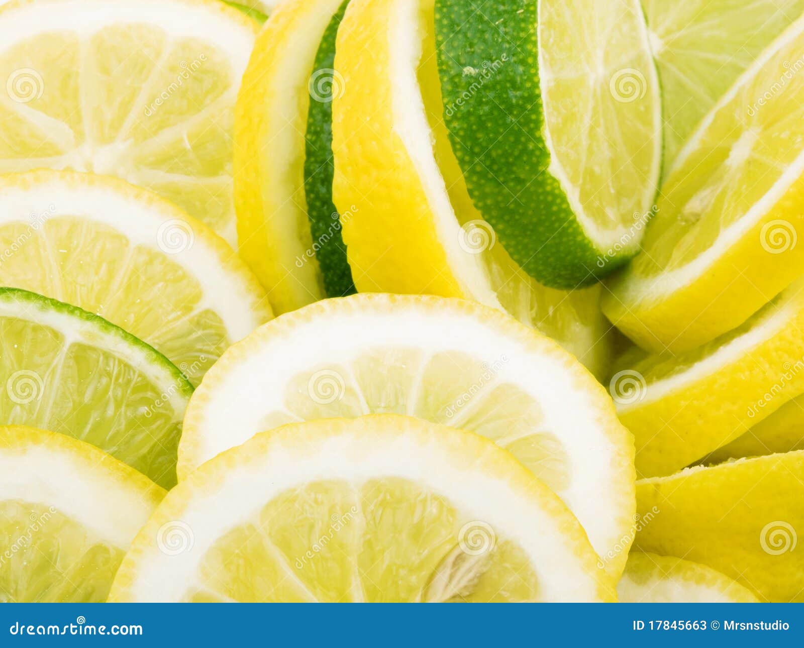 Lemon and lime slices stock image. Image of closeup, lemon - 17845663