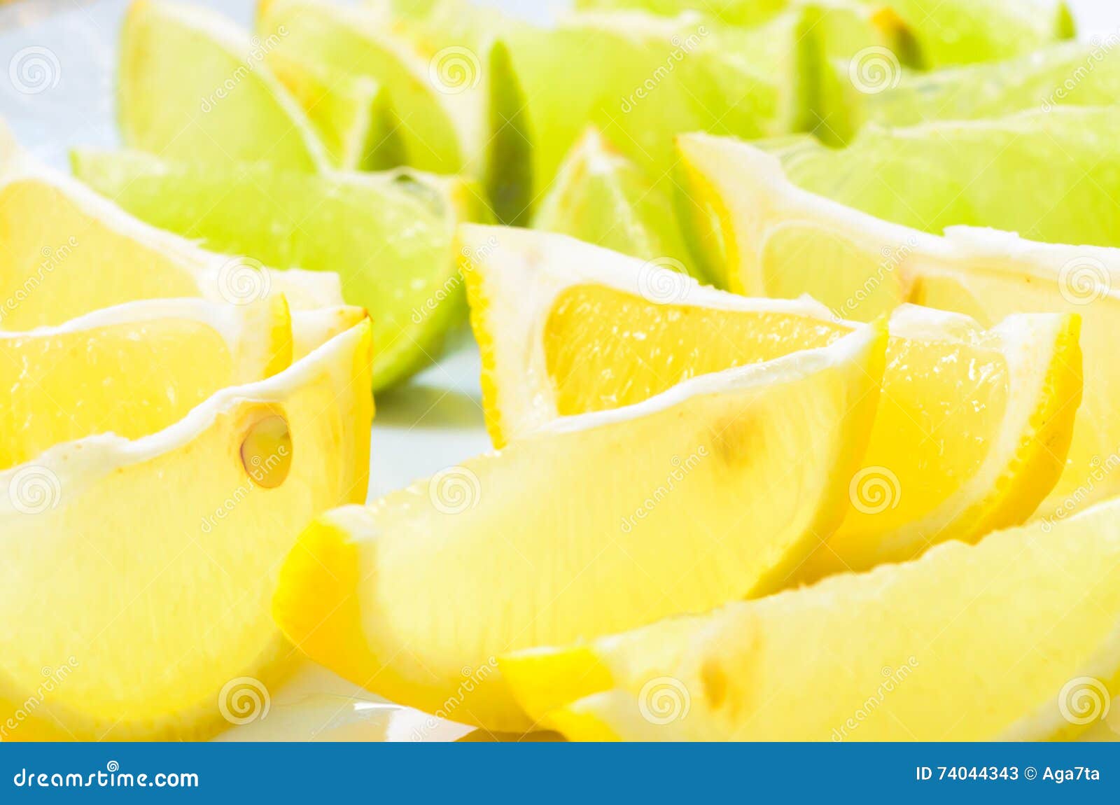 Lemon and lime slices stock image. Image of green, freshness - 74044343