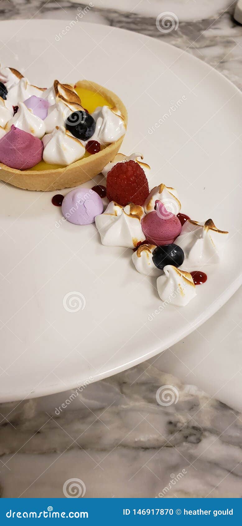 Lemon meringue dessert stock photo. Image of plate, lemon - 146917870