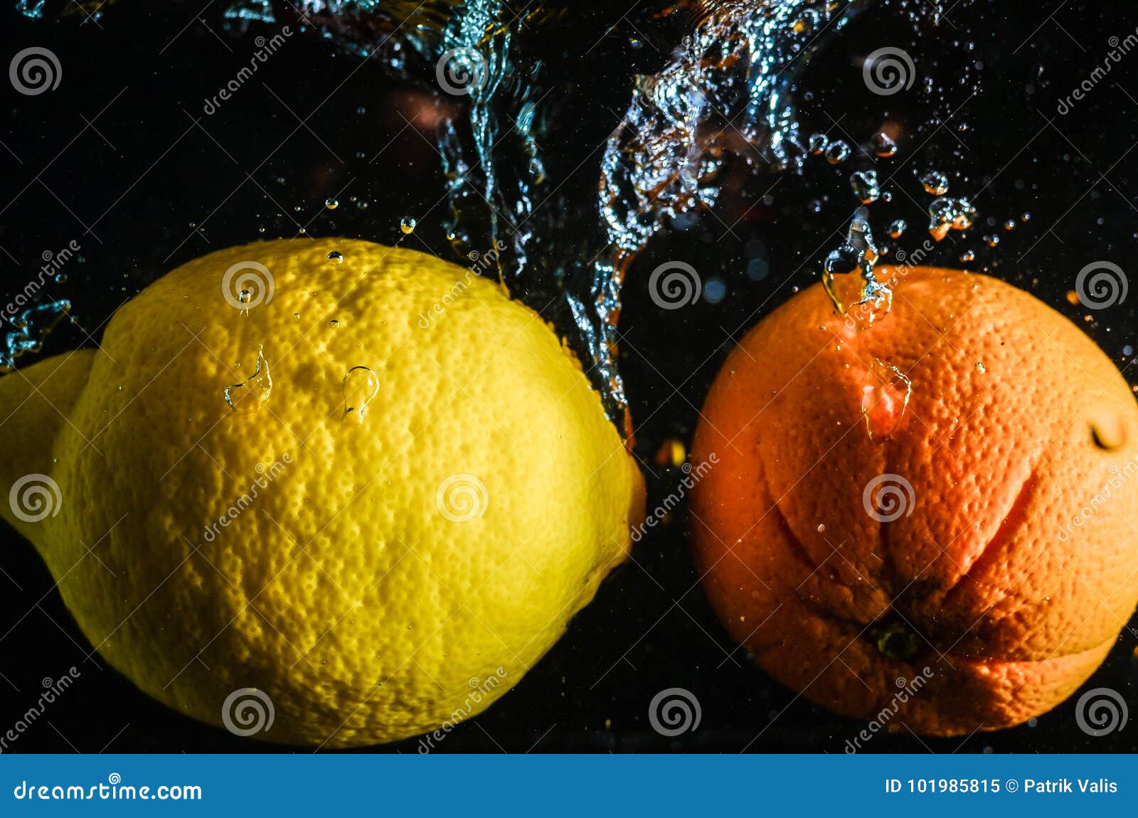 Lemon with Orange in a Water Bath. Stock Image - Image of motion, clean ...