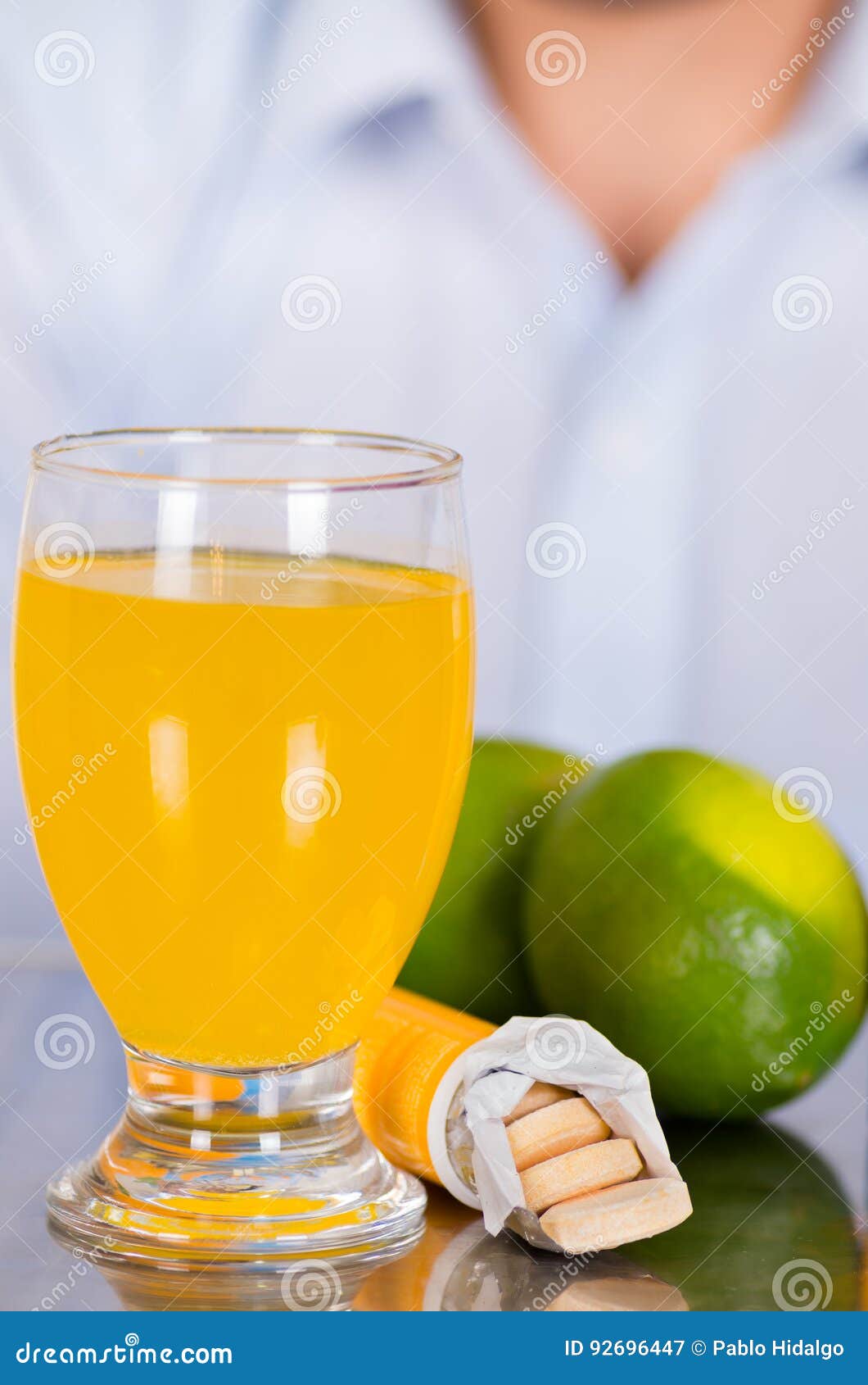 Lemon, Pills of Vitamin C and a Glass of Vitamin C Dissolved Over the ...