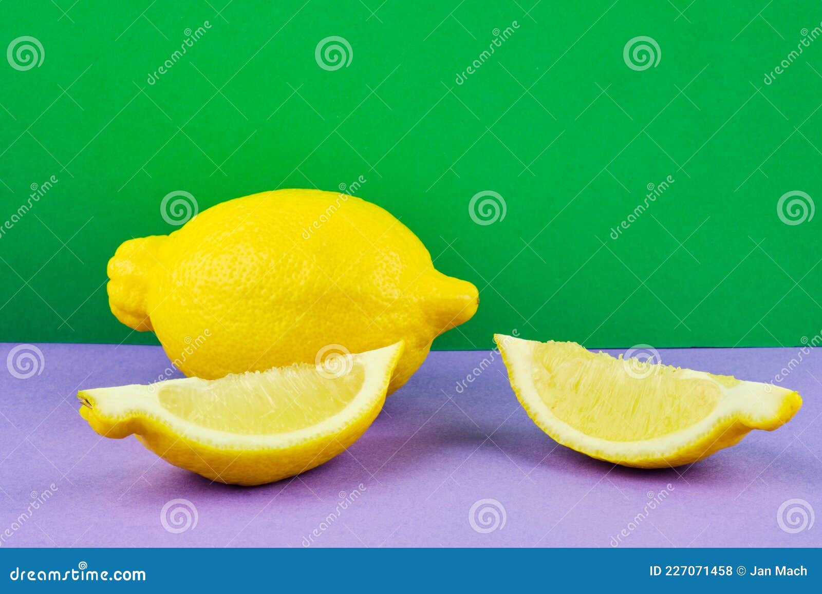 Lemon on Purple and Green Background Stock Photo - Image of lemon ...