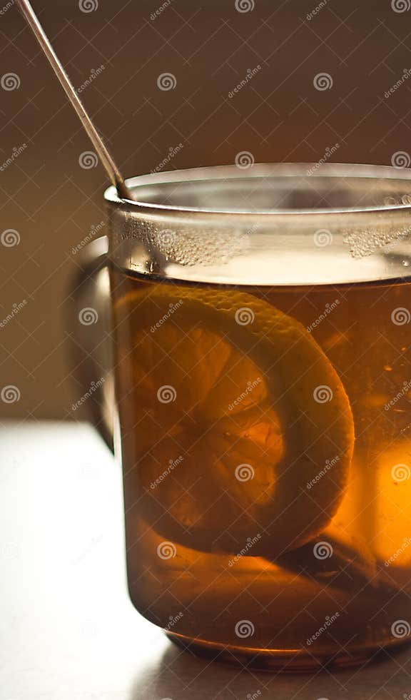 Lemon segment in a tea cup stock image. Image of plant - 13073999