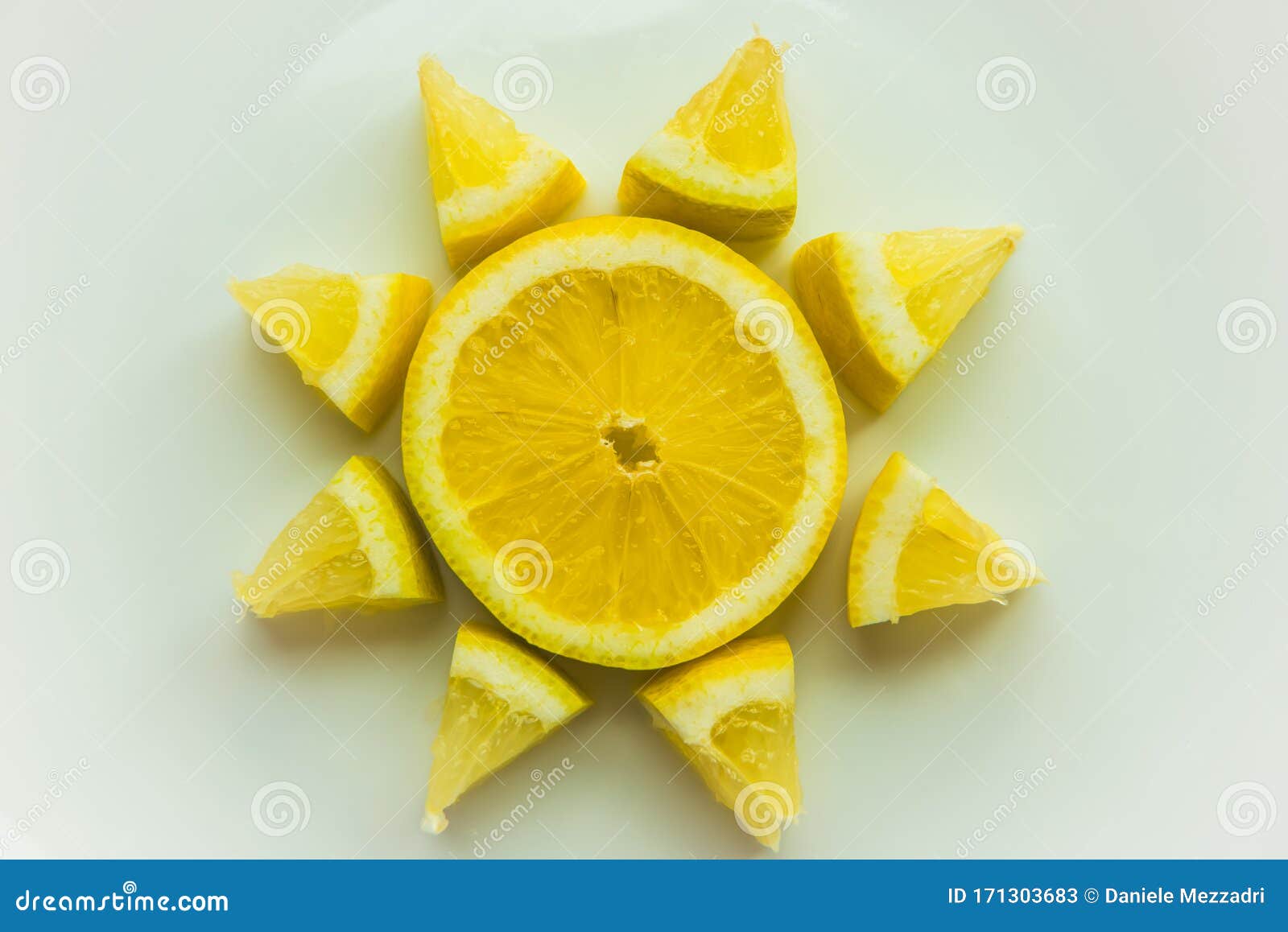 A Lemon Slice in the Shape of the Sun Stock Image - Image of juicy ...