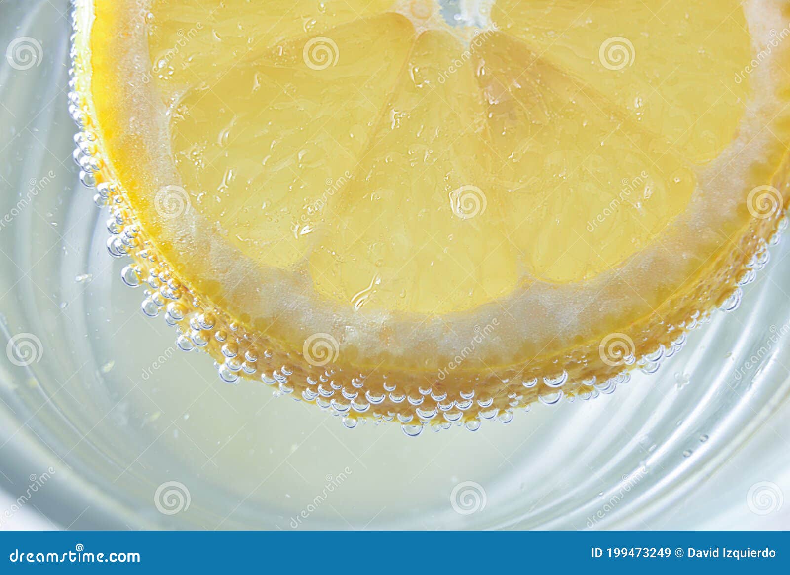 Lemon Slice Floating on Water in a Glass Stock Image - Image of ...