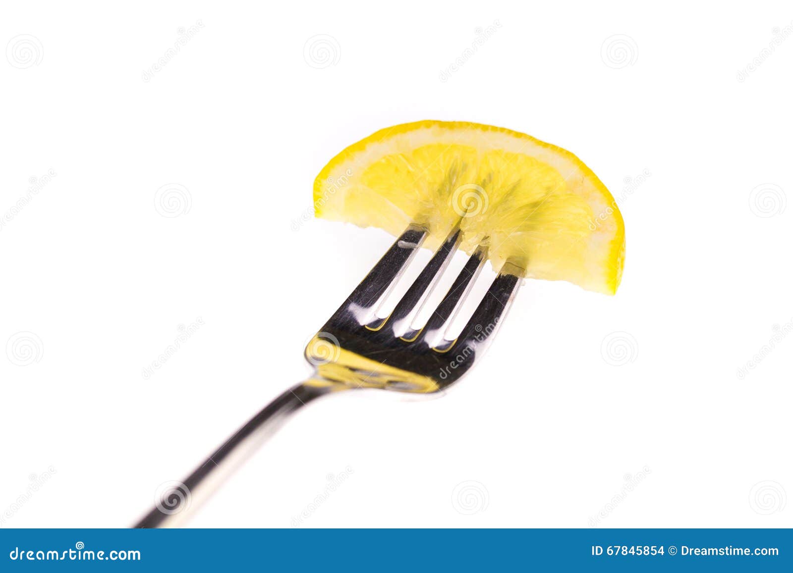 Lemon slice on fork stock photo. Image of sour, healthy - 67845854