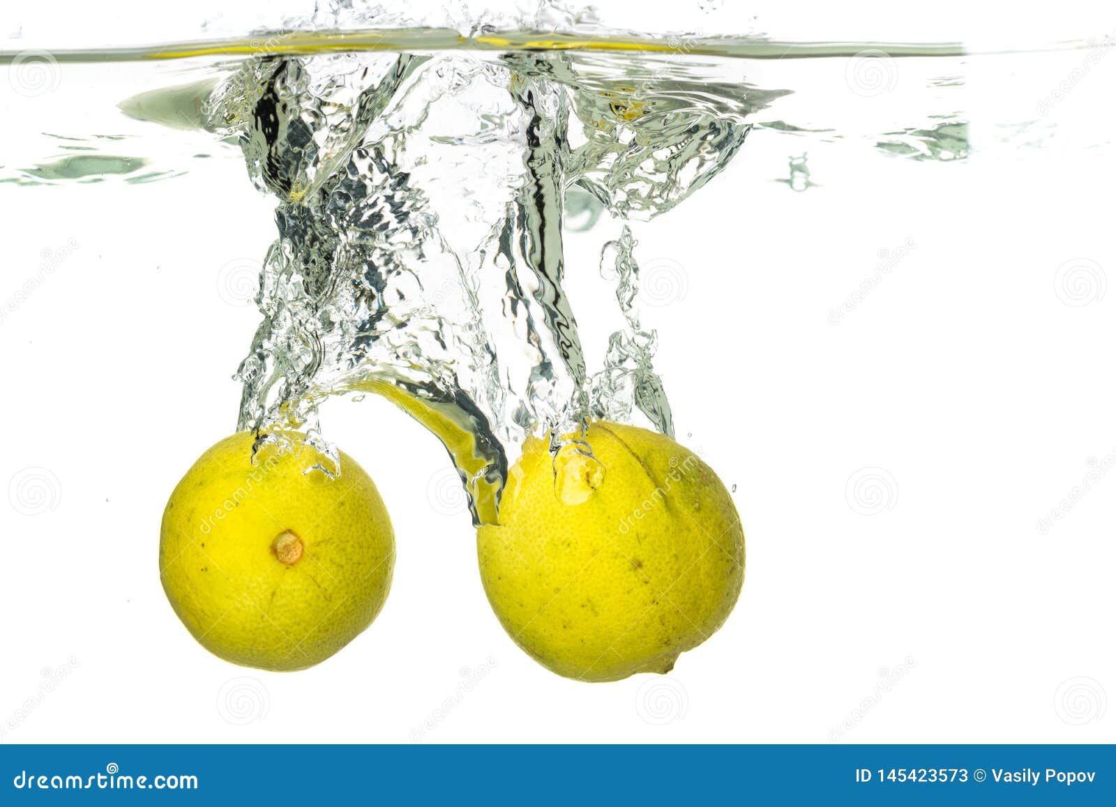 Lemon Slices and Lime Falling into Water and Splash on White Background ...