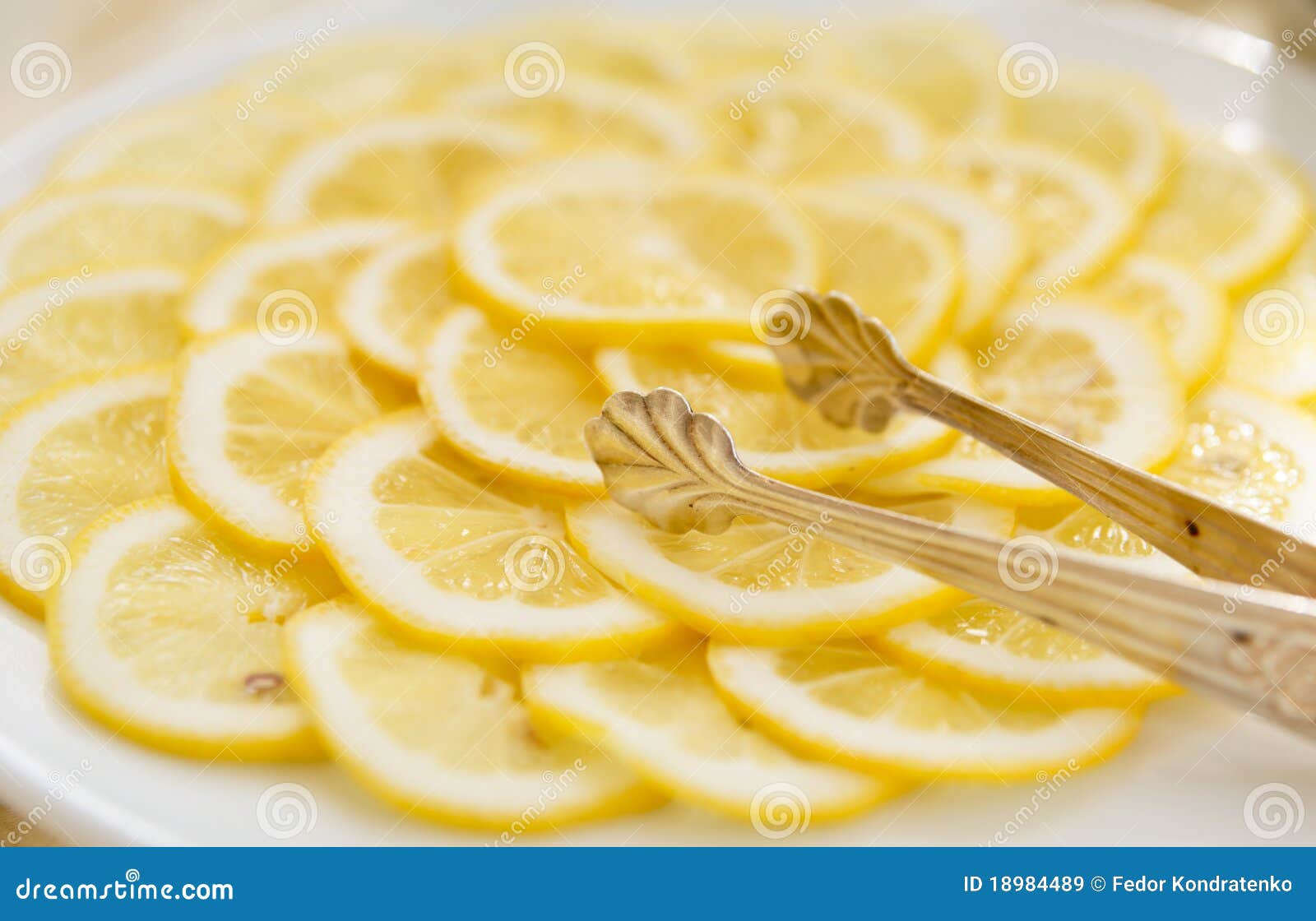 Lemon slices on plate stock image. Image of fruit, pile - 18984489