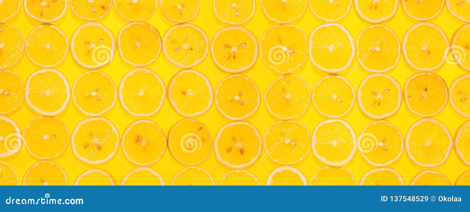 Lemon Slices in Straight Vertical Lines on Yellow Background, Flat Lay ...