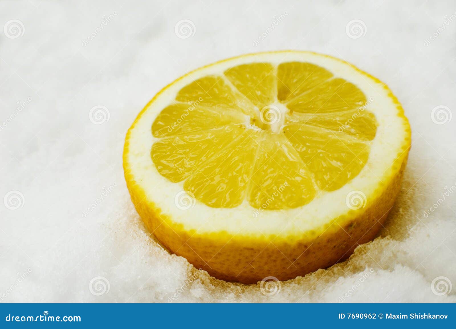 Lemon in snow stock photo. Image of snow, colors, orange - 7690962